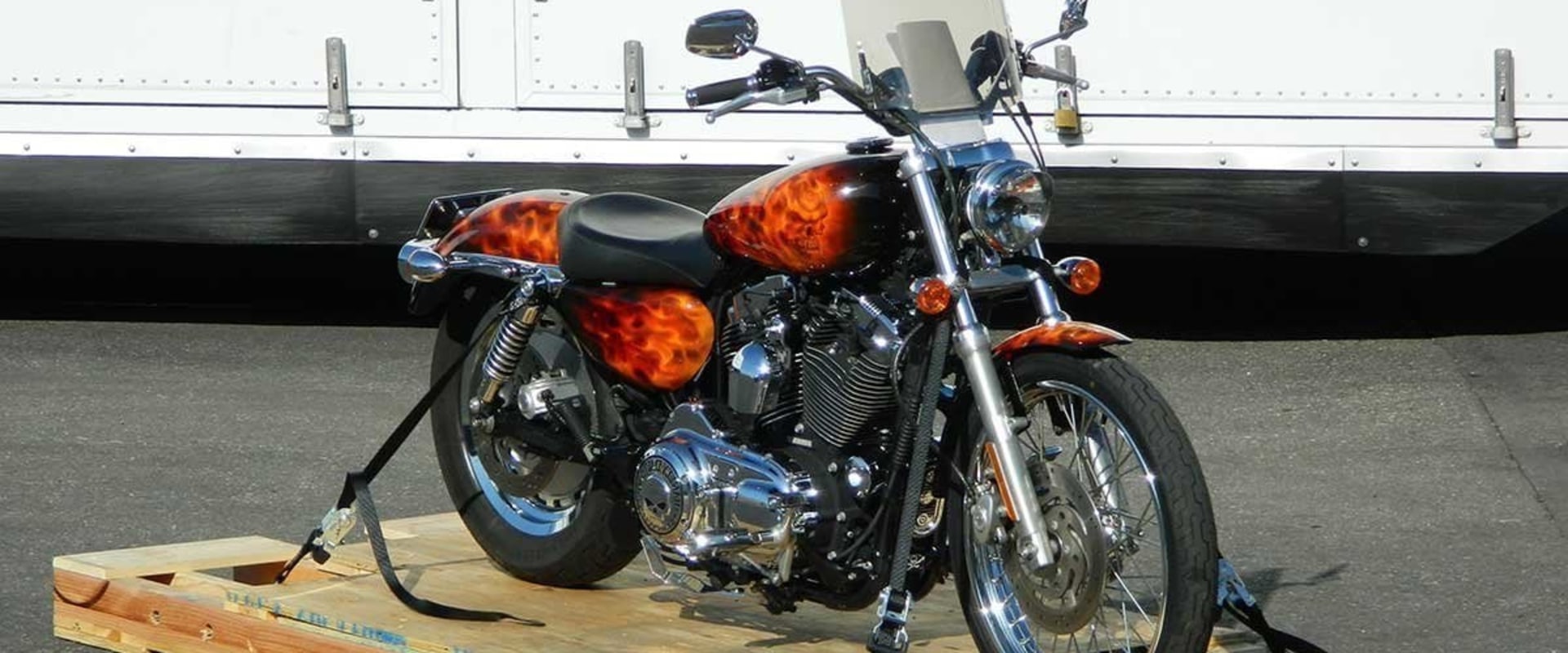 How do you prepare a motorcycle for transport?